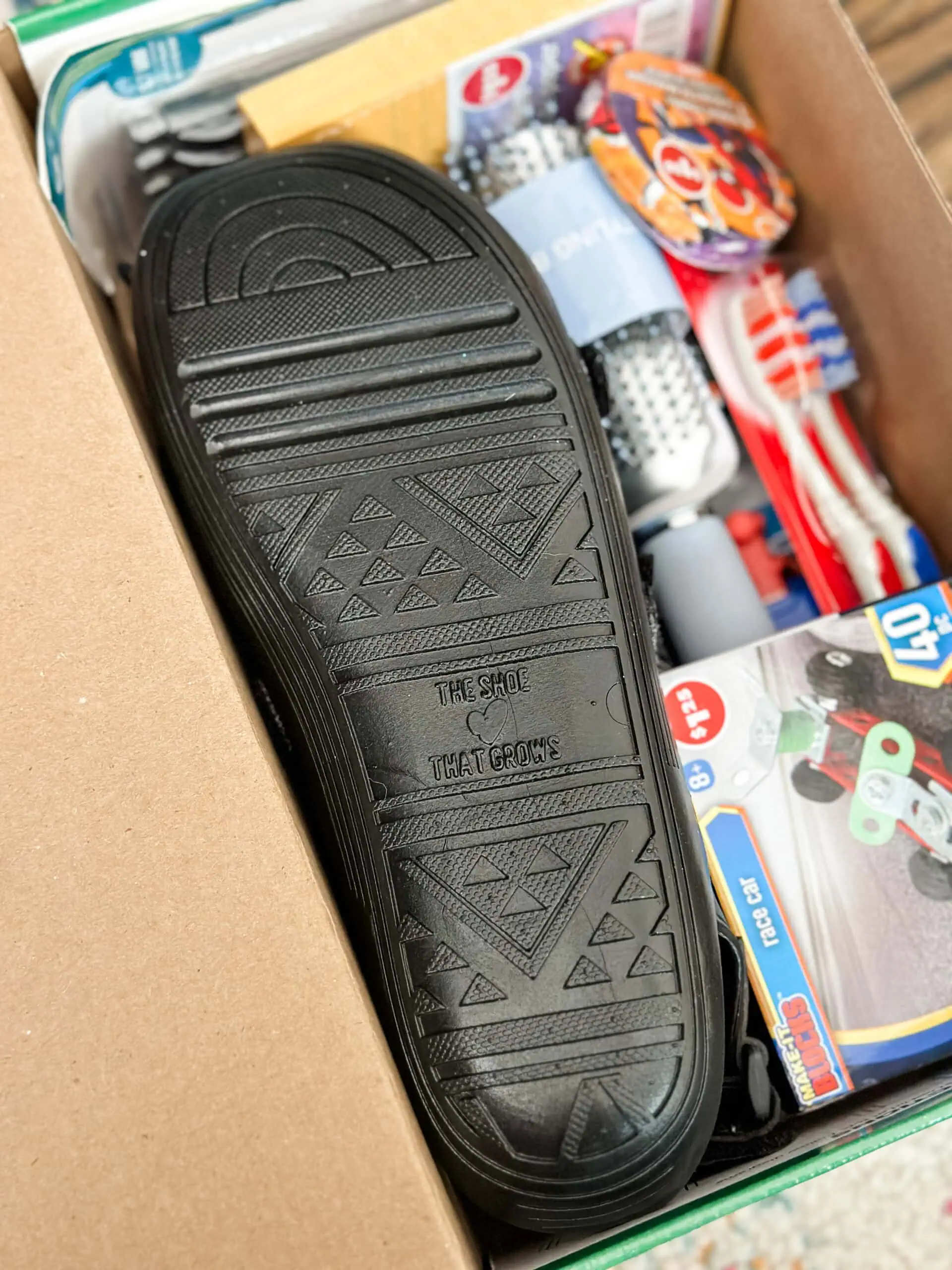 Donate a Pair of Shoes This Christmas from The Shoe That Grows!
